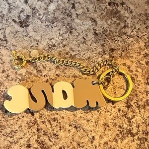 Marc Jacobs | Accessories | Marc Jacobs Gold And White Logo Keychain ...